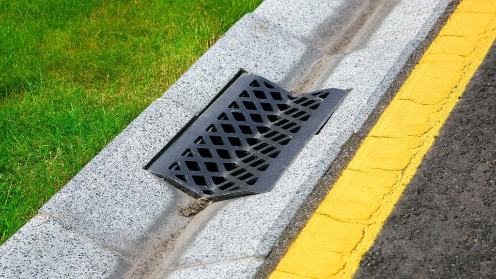 Parking Lot Drainage: Catch Basin vs. French Drain